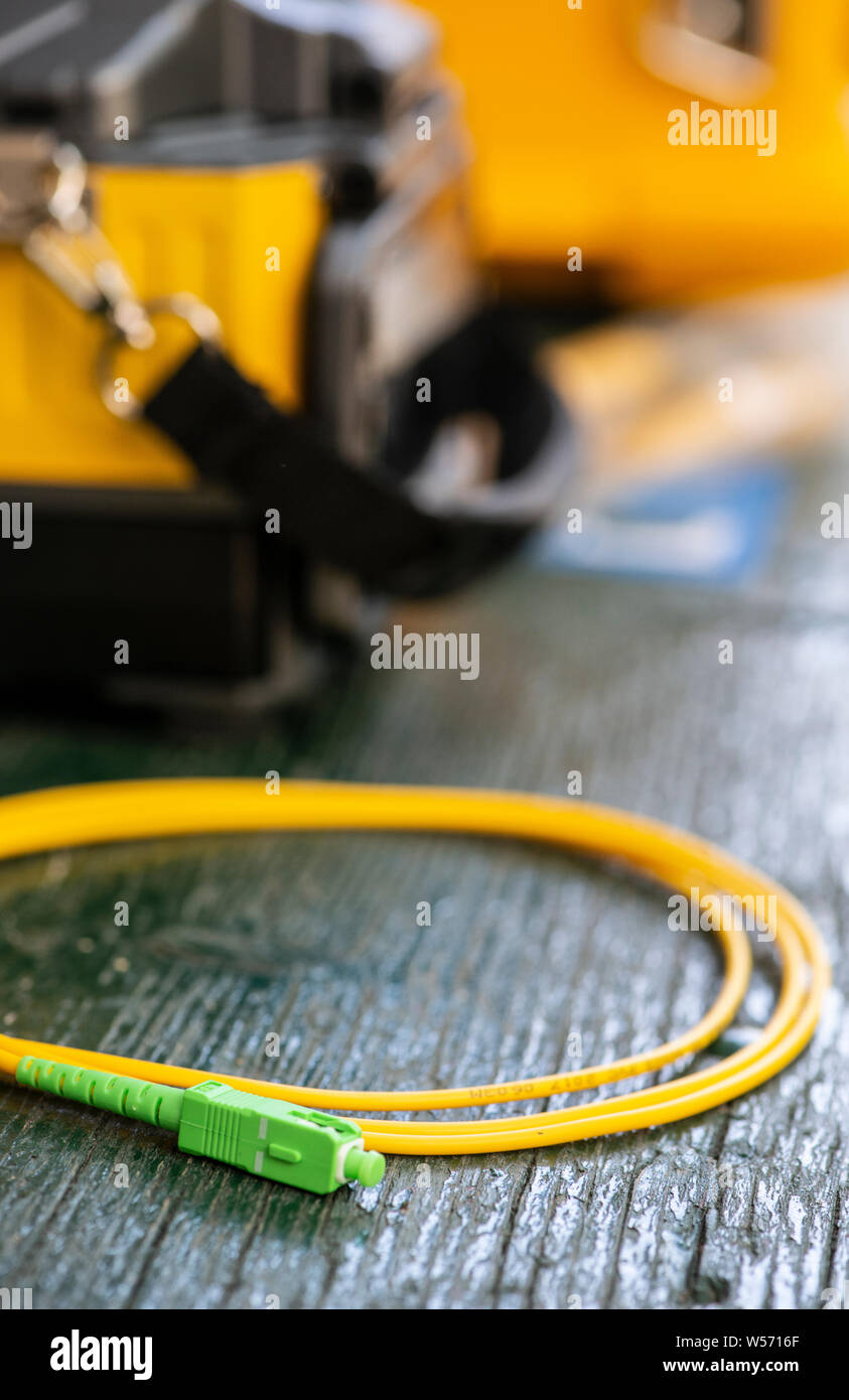 Device for mounting optical cable. Optical internet Technology concept ...