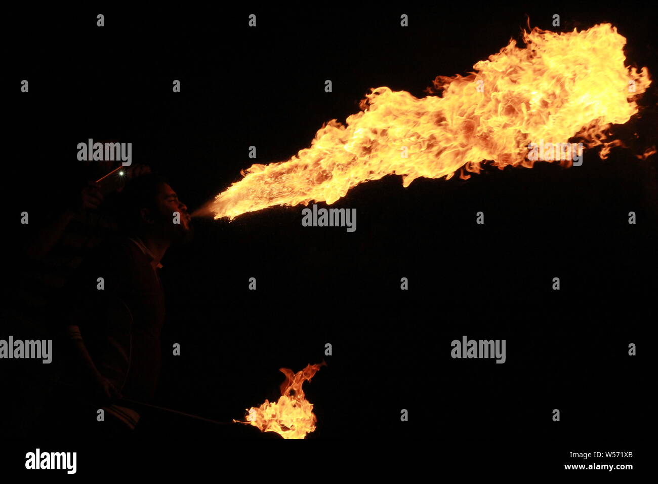 Fire on mouth hi-res stock photography and images - Alamy