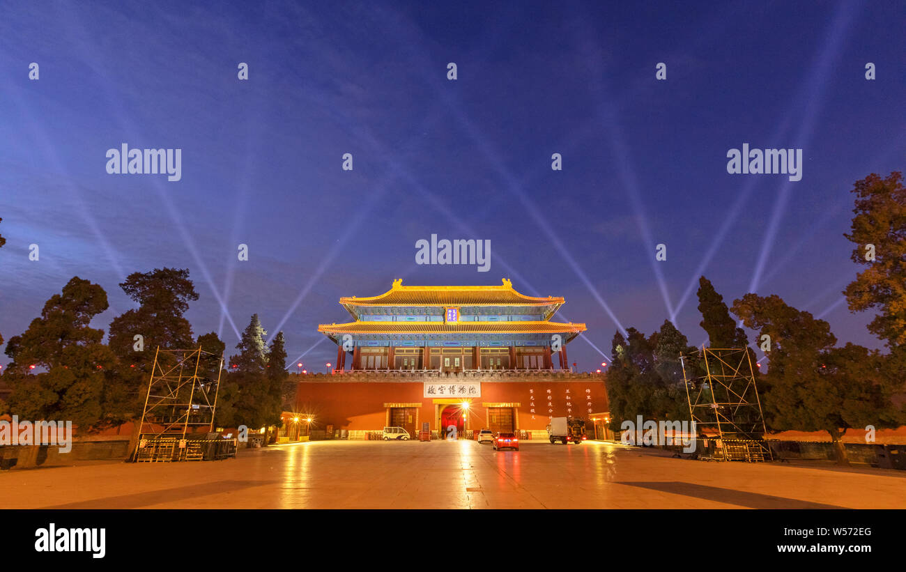 The Palace Museum, also known as the Forbidden City, is illuminated by light projections during ...