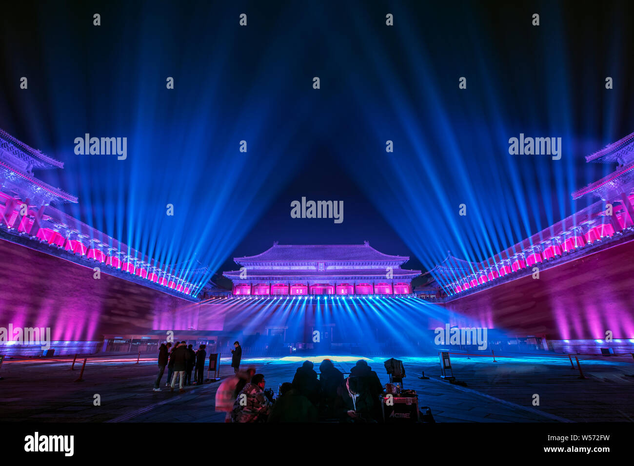 The Palace Museum, also known as the Forbidden City, is illuminated by colorful lights during a ...