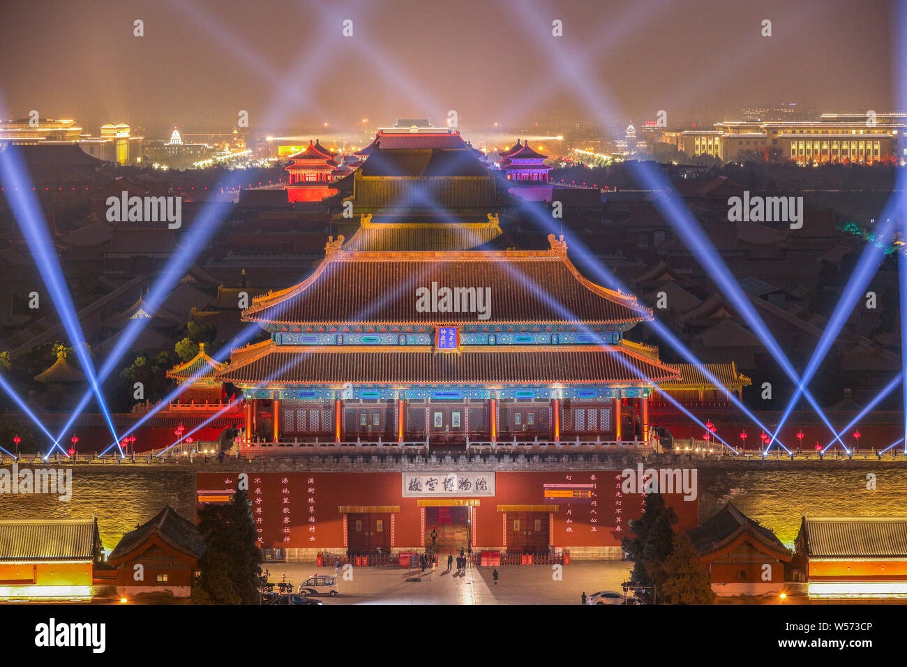 The Palace Museum, also known as the Forbidden City, is illuminated by ...
