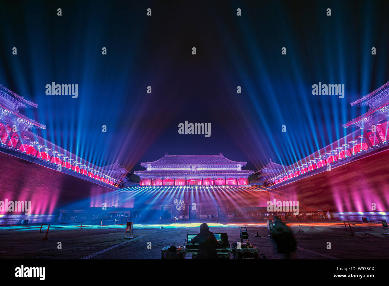 The Palace Museum, also known as the Forbidden City, is illuminated by ...