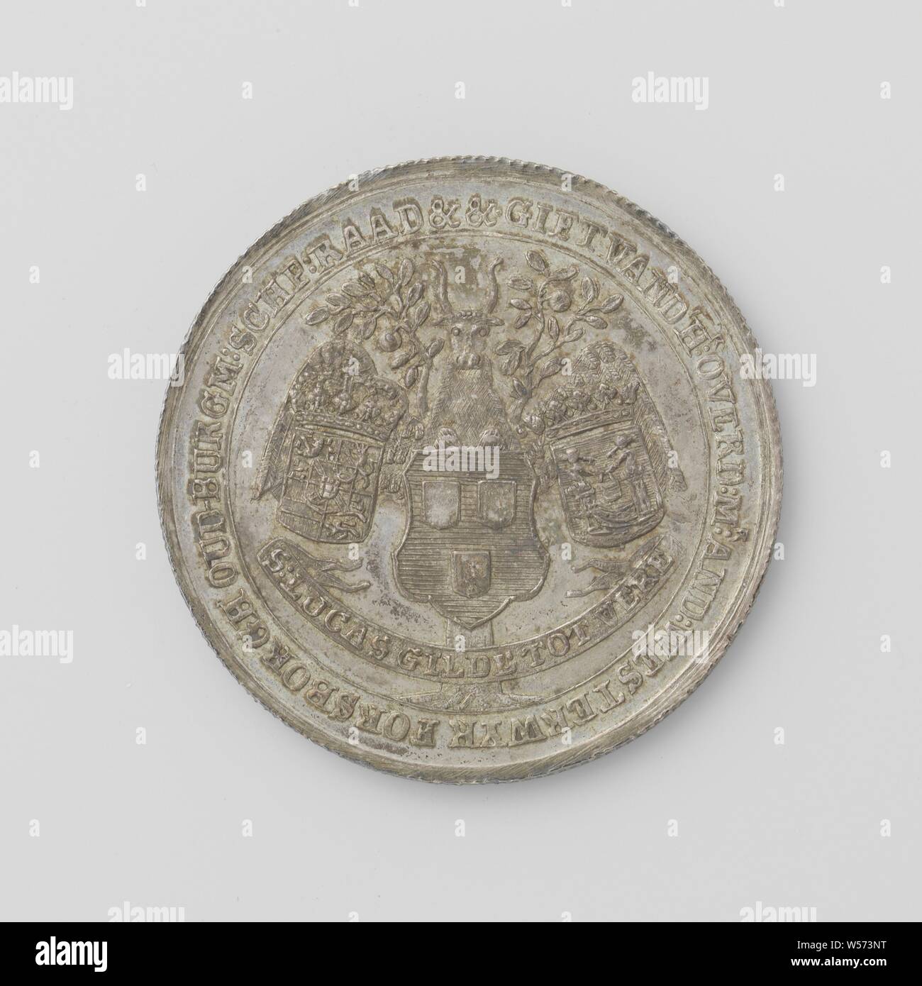 Winged ox holding two crowned coats hi-res stock photography and images ...