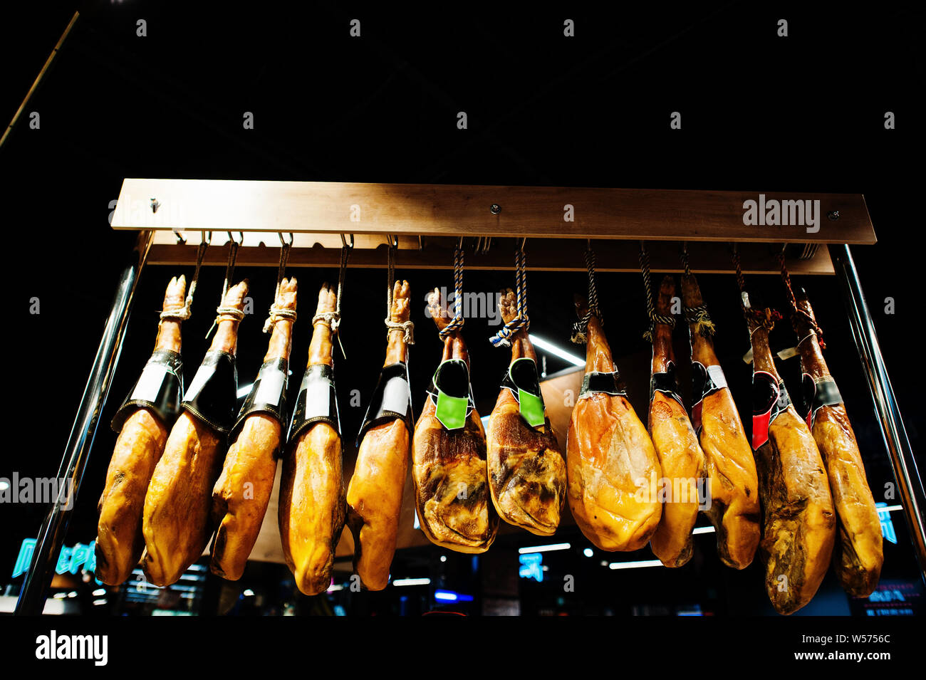 Traditional spanish jamon ham for sale at supermarket Stock Photo - Alamy