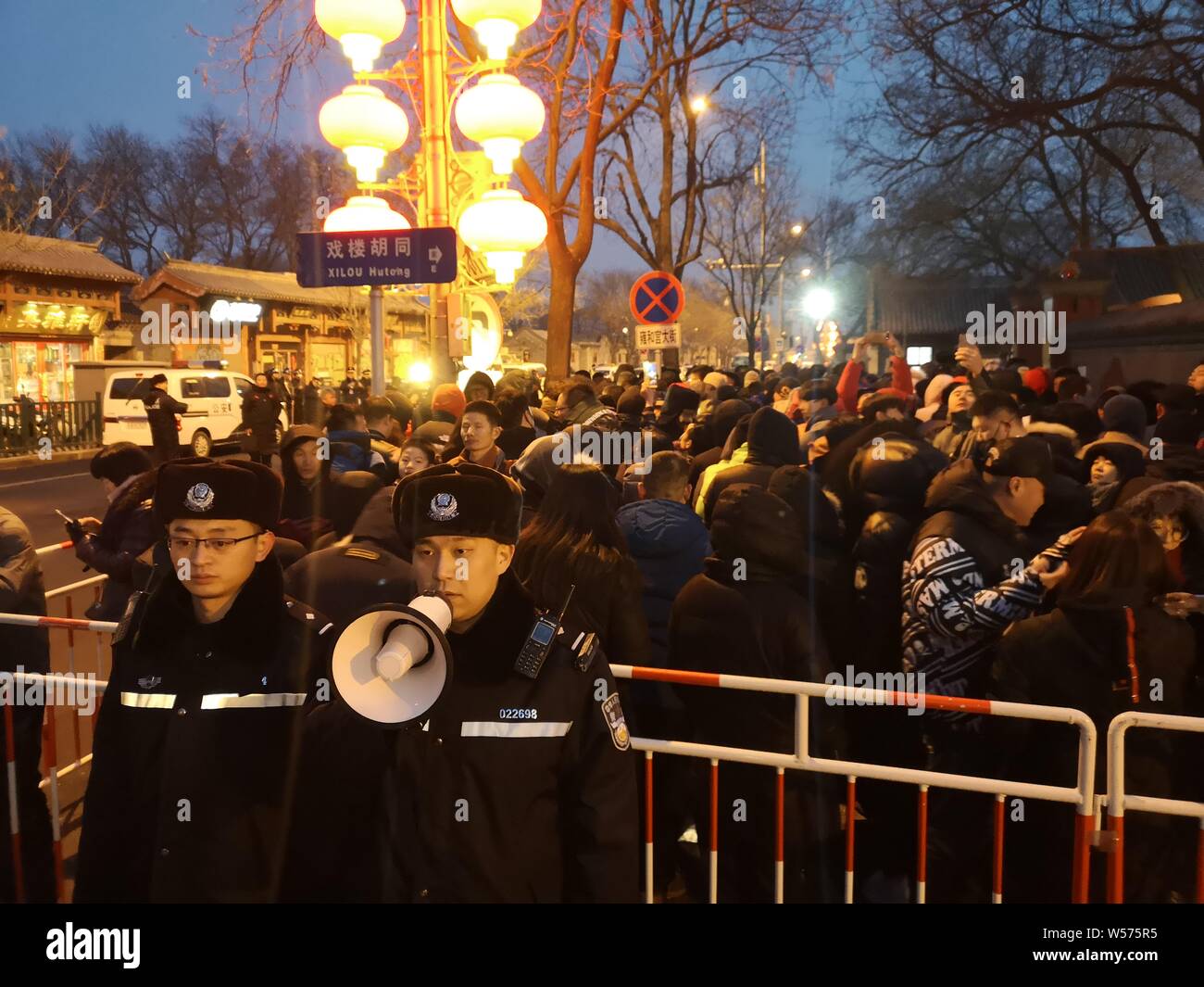 Chinese worshippers queue up outside the Lama Temple overnight to pray ...