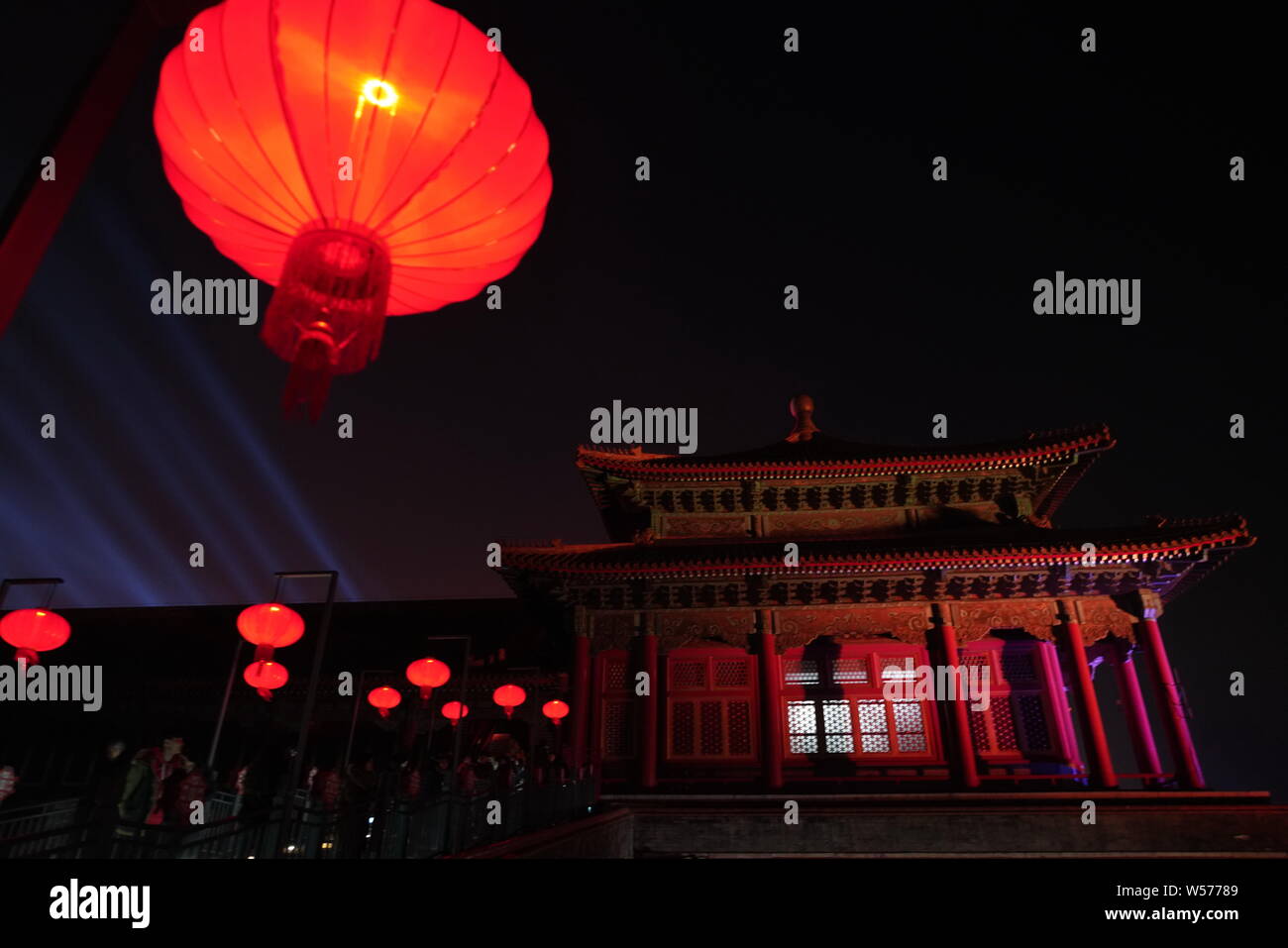 The Palace Museum, also known as the Forbidden City, is illuminated by ...