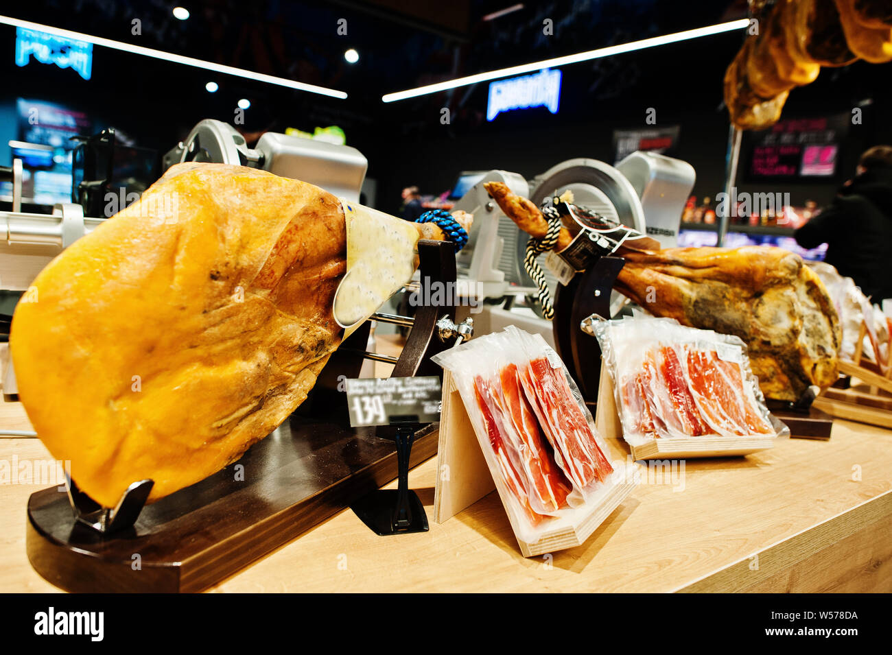 Traditional spanish jamon ham for sale at supermarket Stock Photo - Alamy