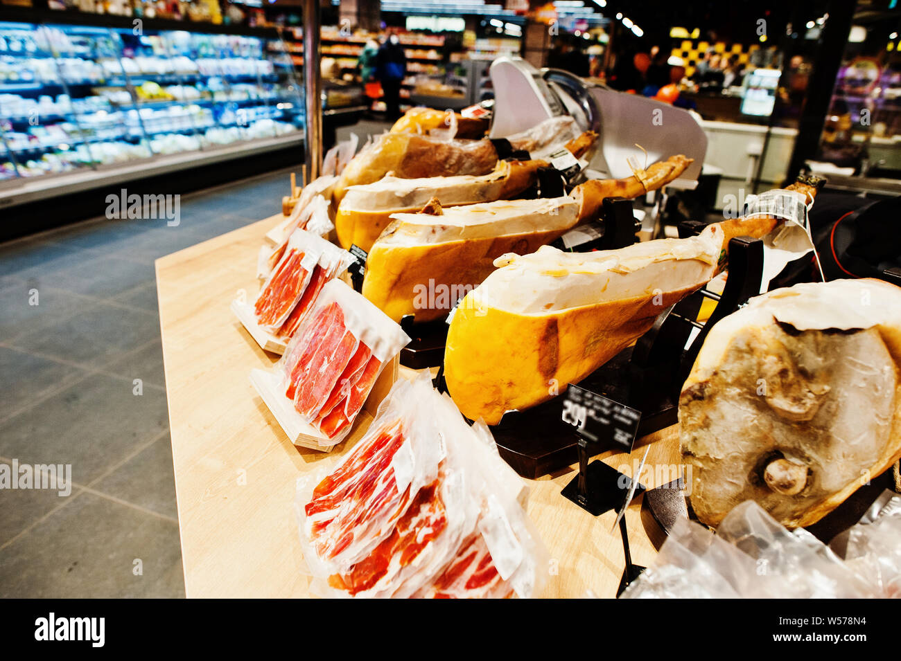 Traditional spanish jamon ham for sale at supermarket Stock Photo - Alamy