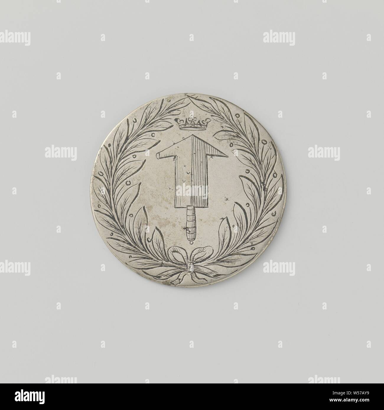 Crowned plumbers hammer inside laurel wreath hi-res stock photography ...