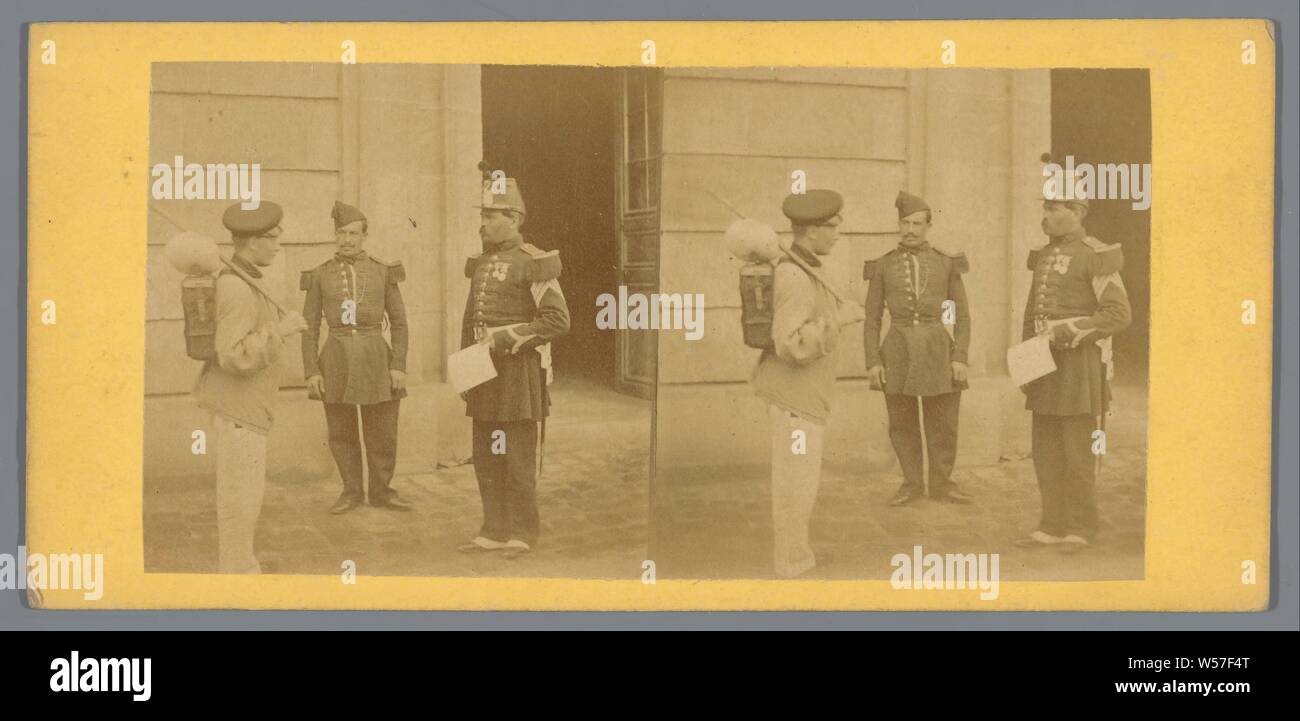 Two soldiers and a man with a backpack for a barracks, the soldier, the ...