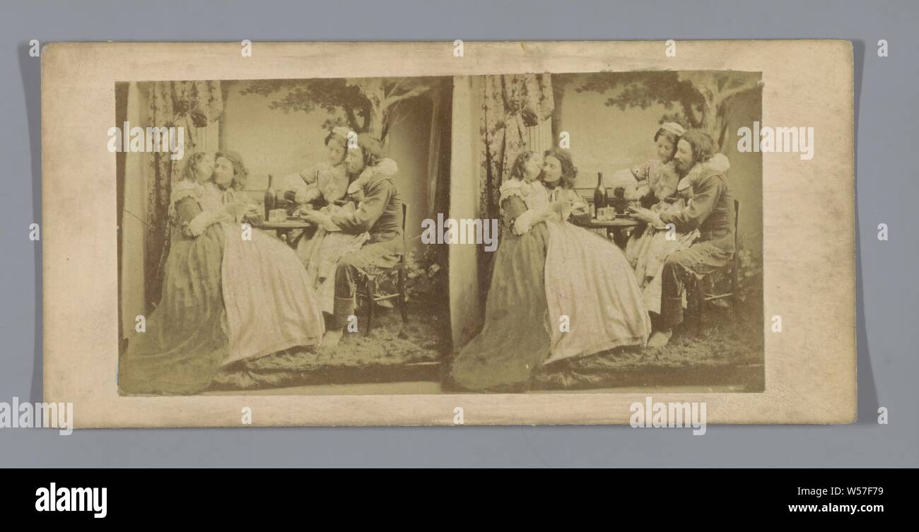 Two couples sitting on each other's lap in historical costumes, summer ...