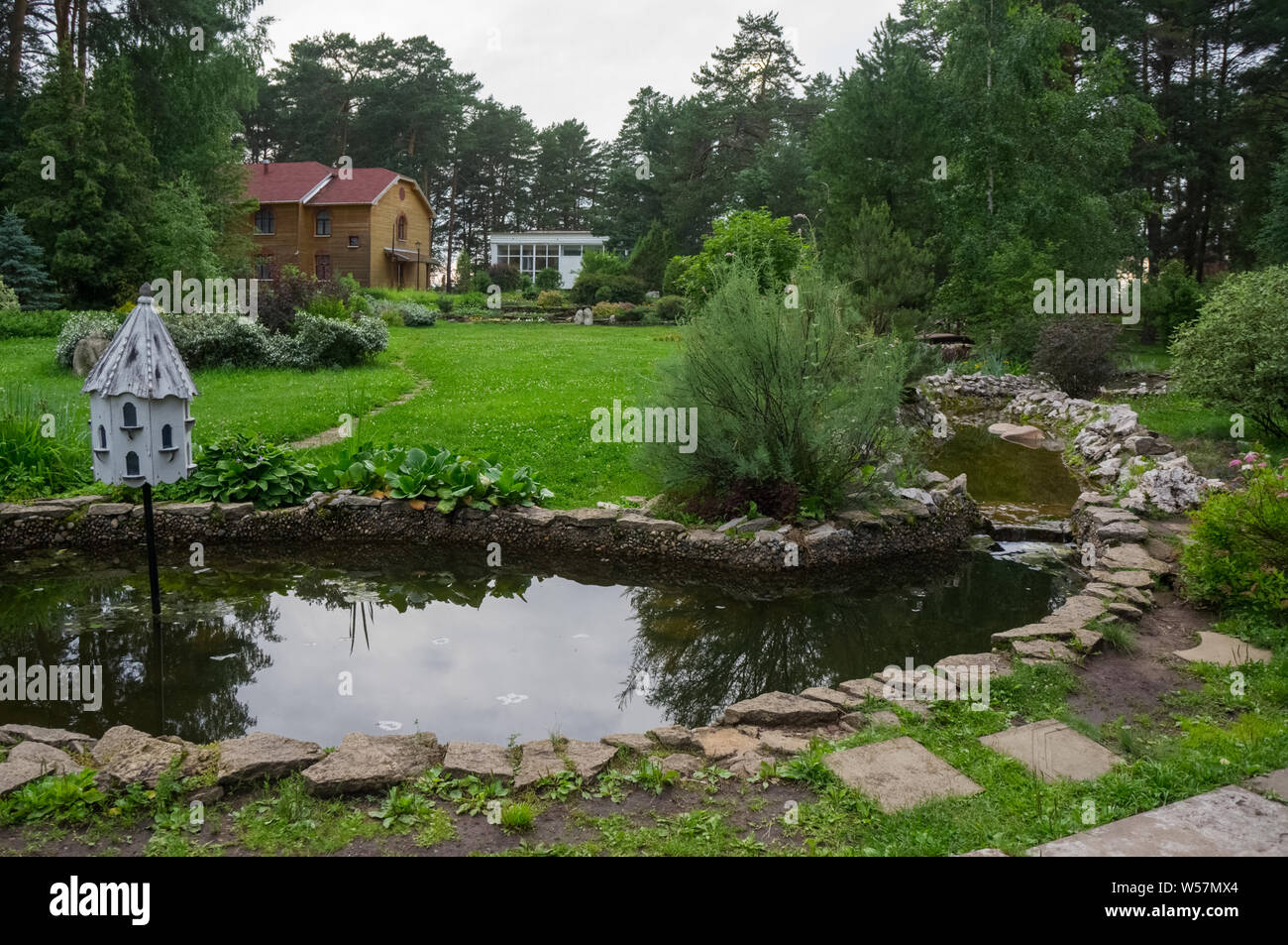 Hand-made river in the Japanese-style garden Stock Photo - Alamy
