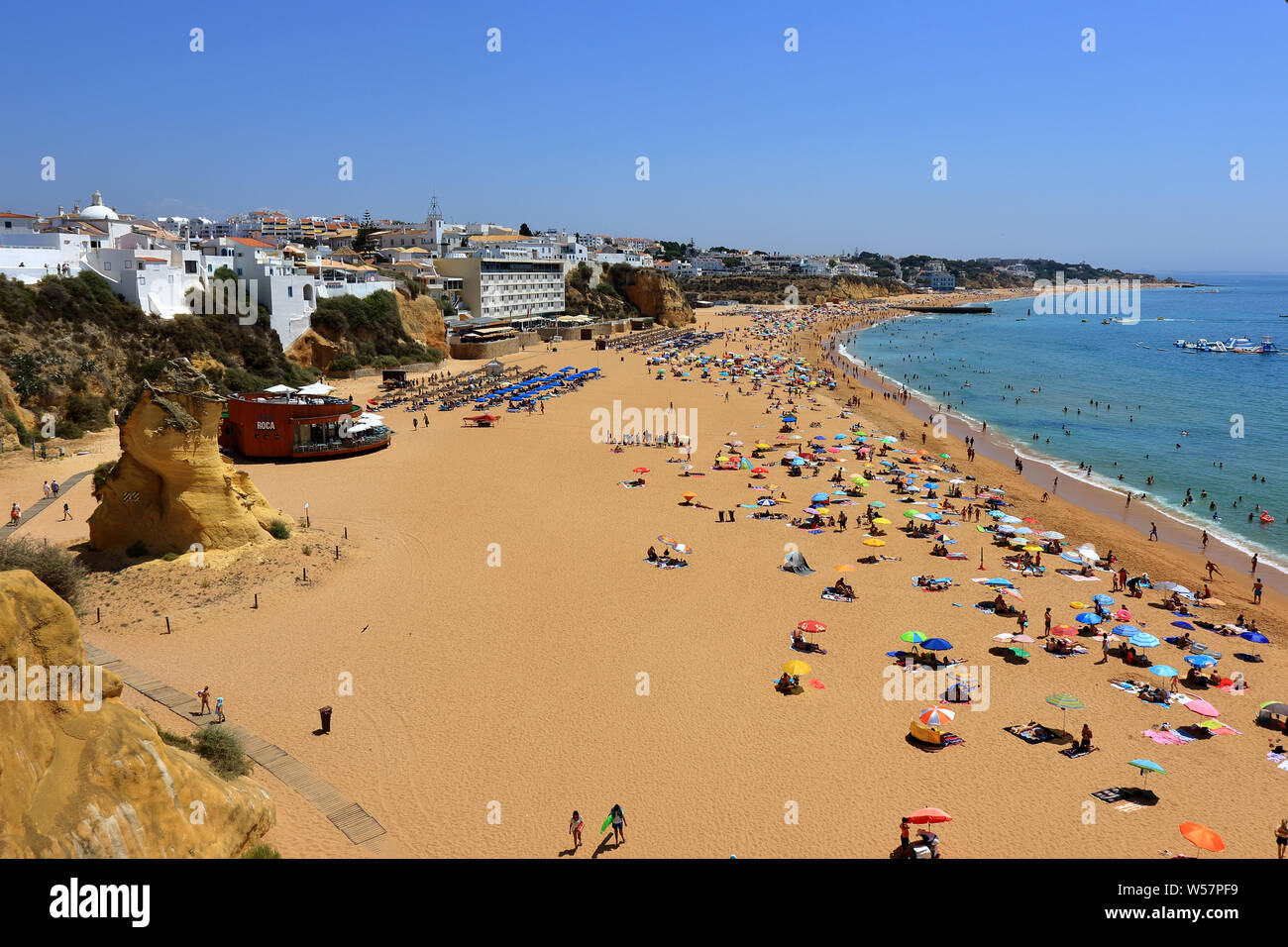 The town of Albufeira and the sandy beach Stock Photo - Alamy