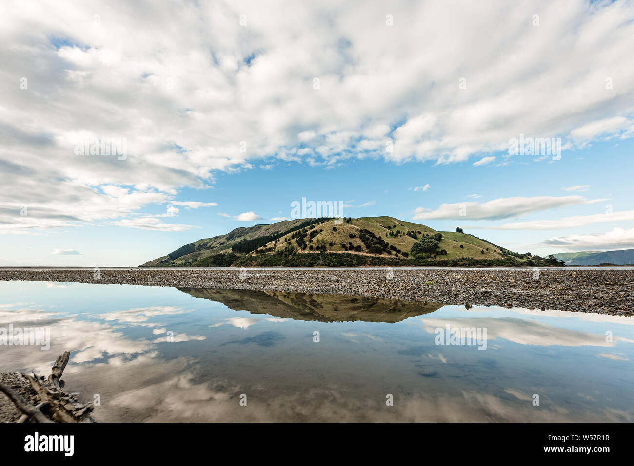 Landscape photo with reflection of Pepin Island in Cable Bay, NZ Stock ...