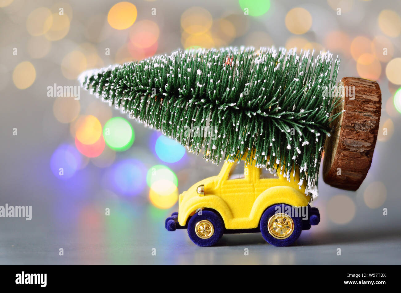 Christmas tree on toy car. Christmas holiday celebration concept Stock ...
