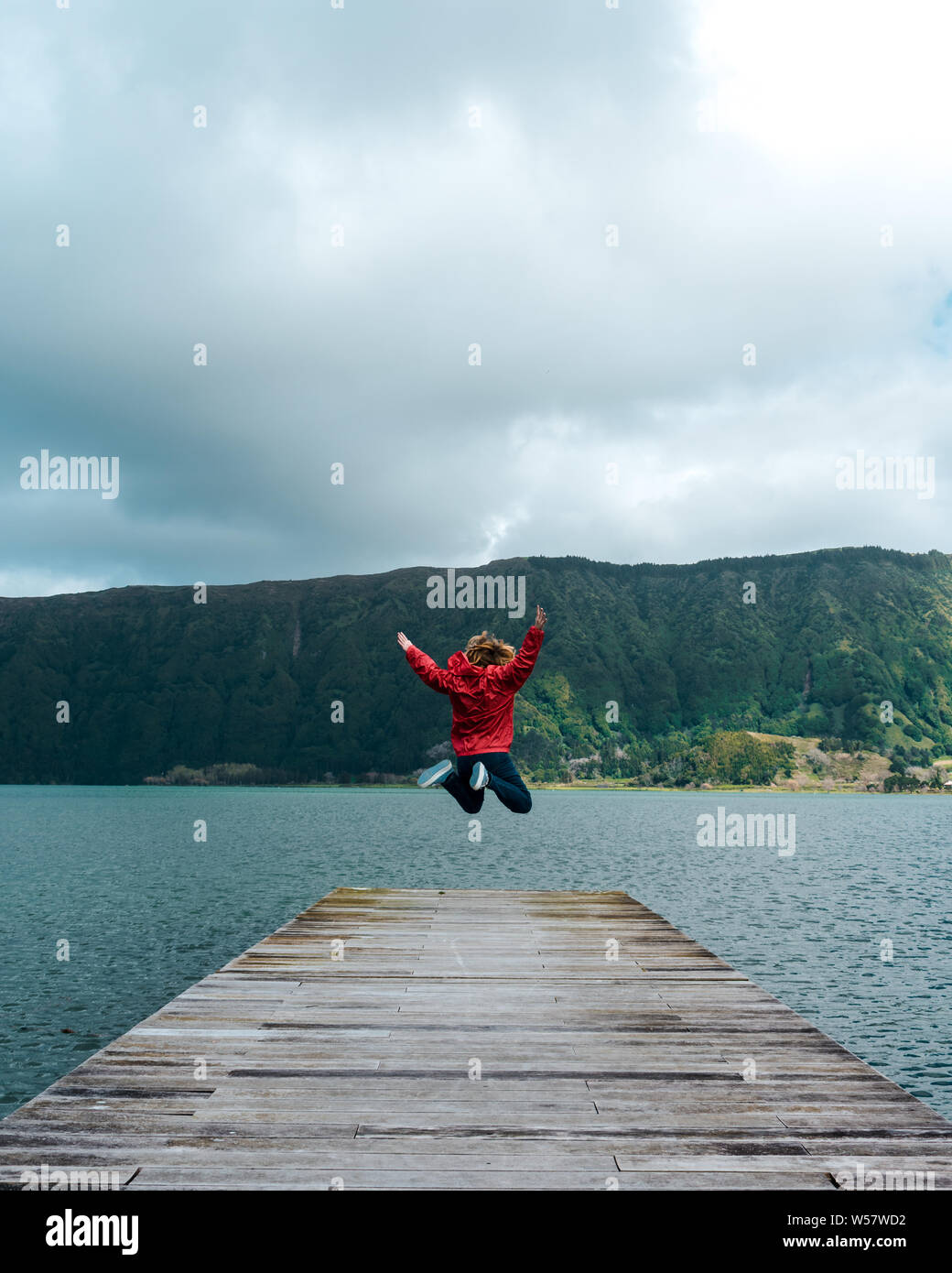 Person jumping into a lake hi-res stock photography and images - Alamy