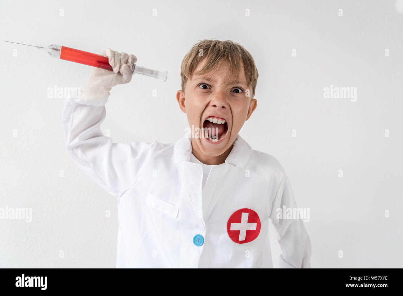 Mad doctor syringe hi-res stock photography and images - Alamy