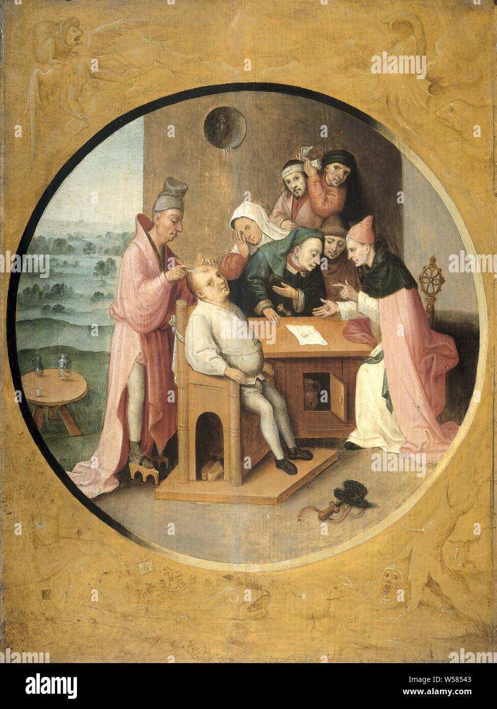 Removing the Rocks in the Head', Cutting the boulder. A man is tied up ...