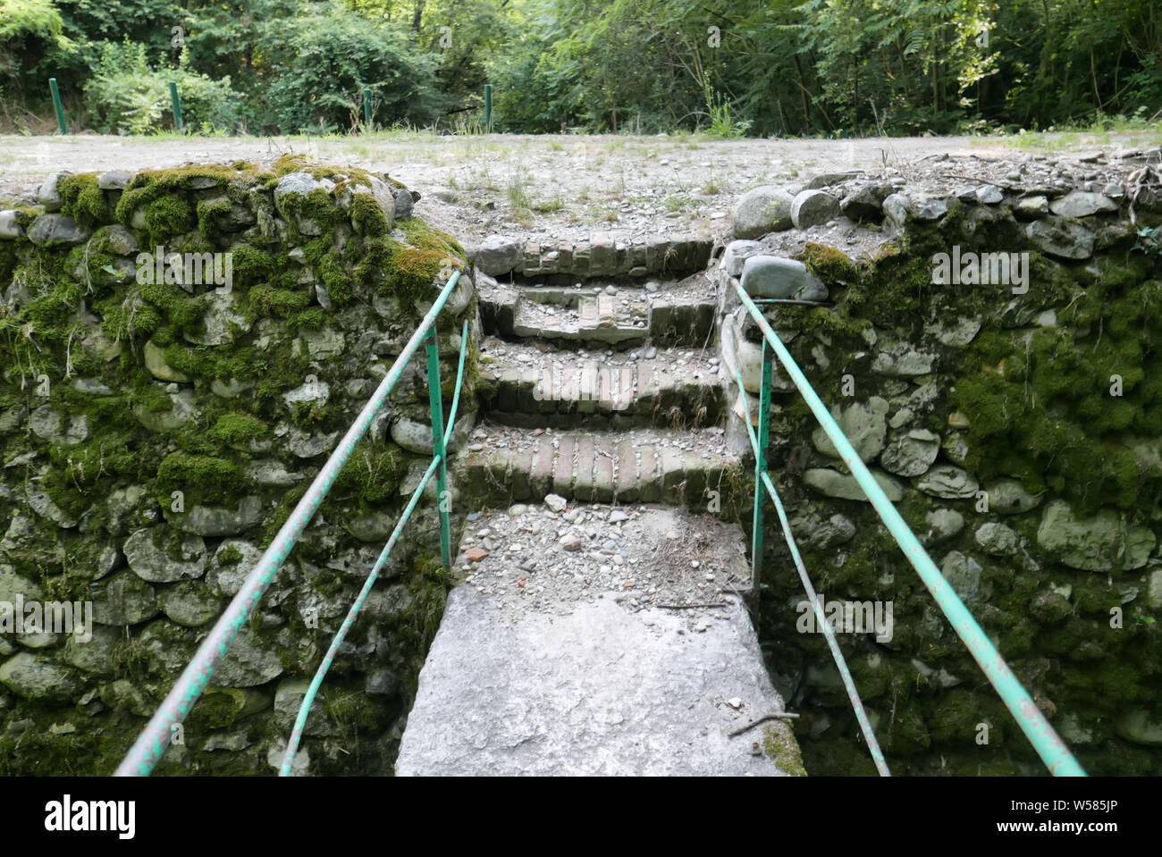 stone wall bridge along mountain trail in Piedmont Italy Stock Photo ...