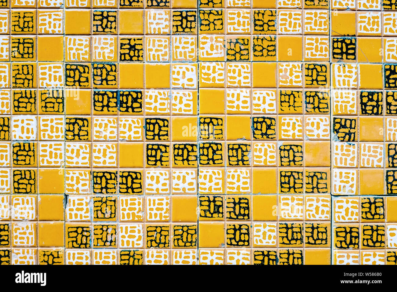 Orange colored tile background Stock Photo - Alamy