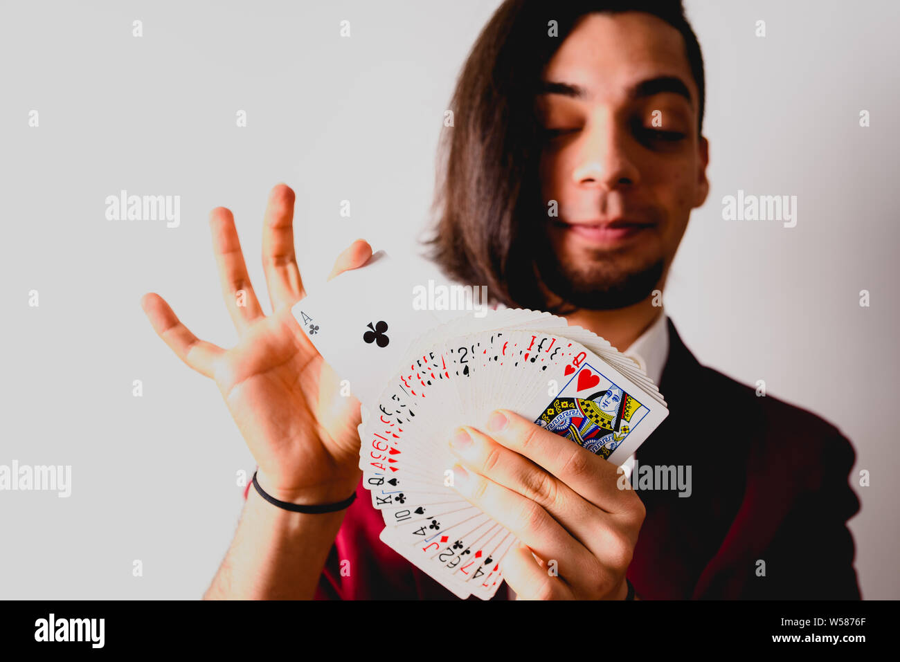 Magician doing tricks hi-res stock photography and images - Alamy