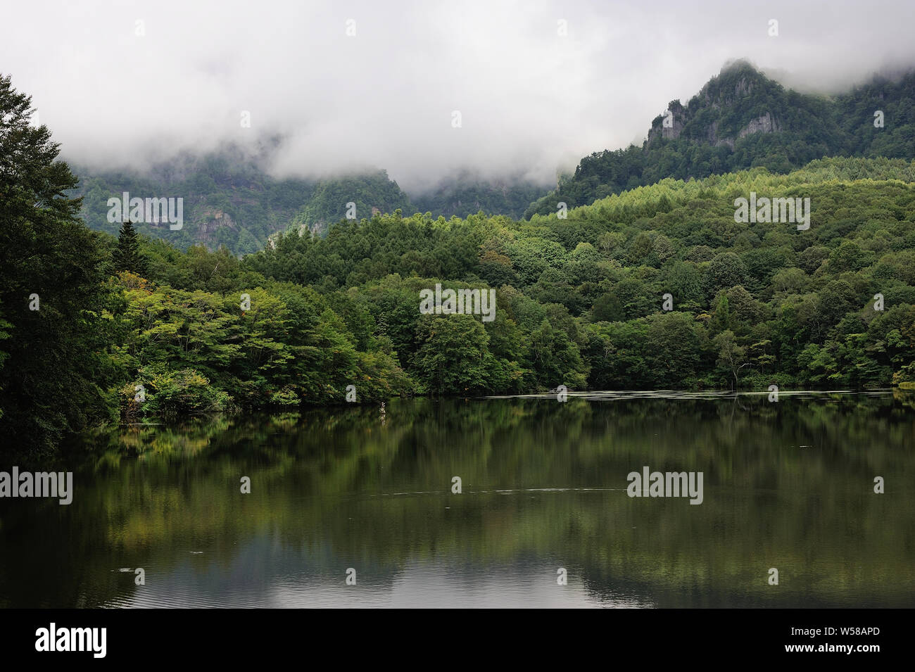 View towards mountains over Lake Kagamiike, Togakushi, Nagano, Japan ...