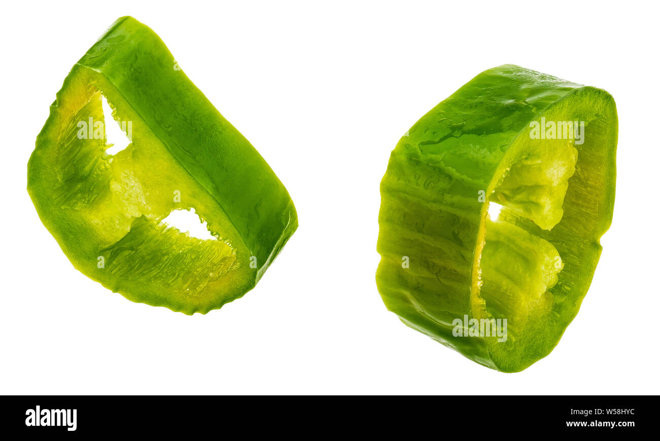 Fresh green chillies cut into rings. Isolated on white background Stock ...