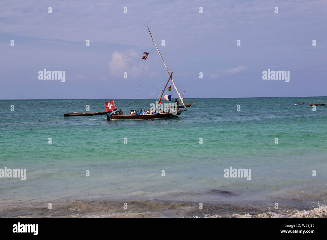 Boats on Nungwi beach of Zanzibar, Tanzania Stock Photo - Alamy