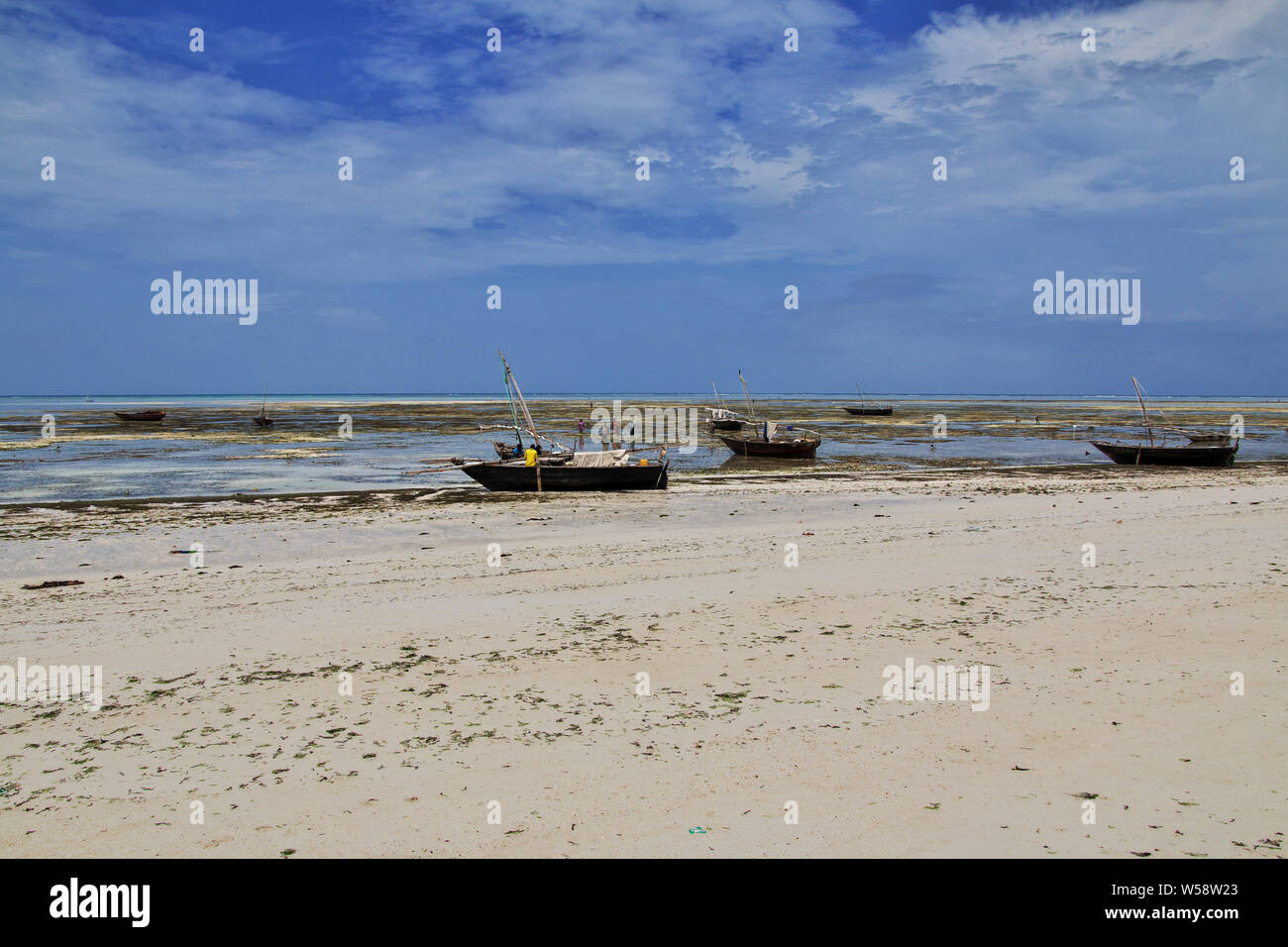 Boats on nungwi beach hi-res stock photography and images - Alamy