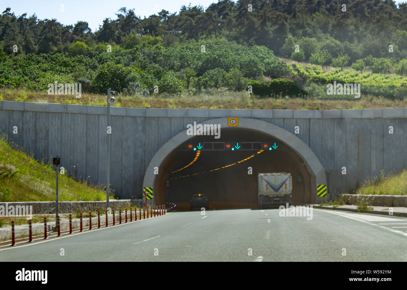 Multi lane highway car tunnel entrance Stock Photo - Alamy