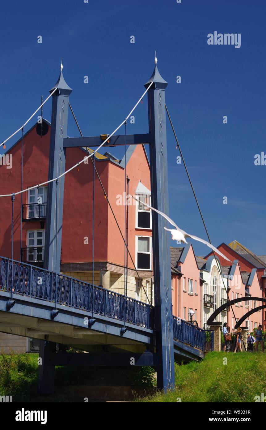 Cricklepit Suspension Bridge over the River Exe at Exeter Quay. Devon ...