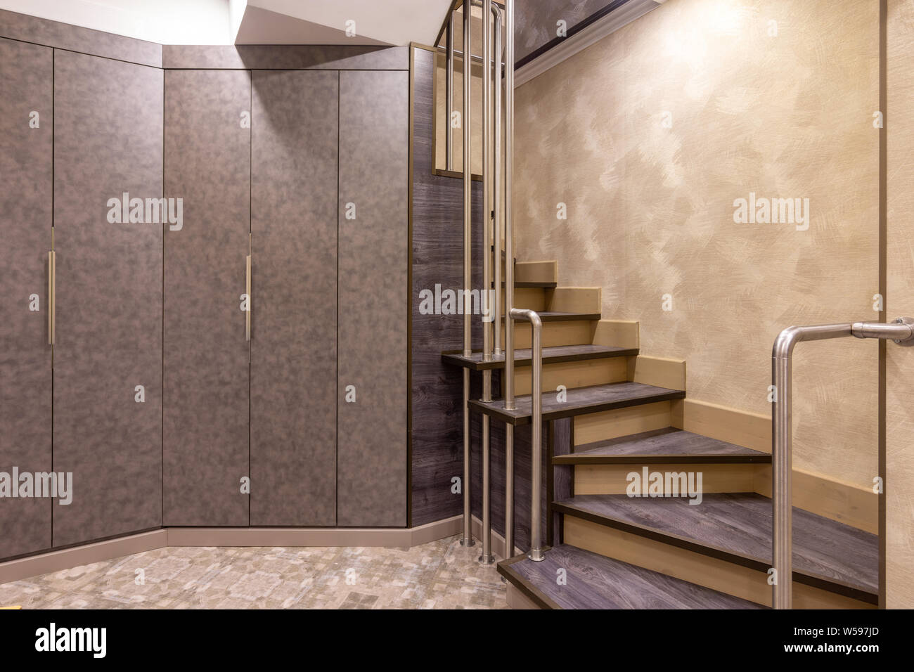 Large wardrobe in the hallway and stairs to the second floor Stock ...