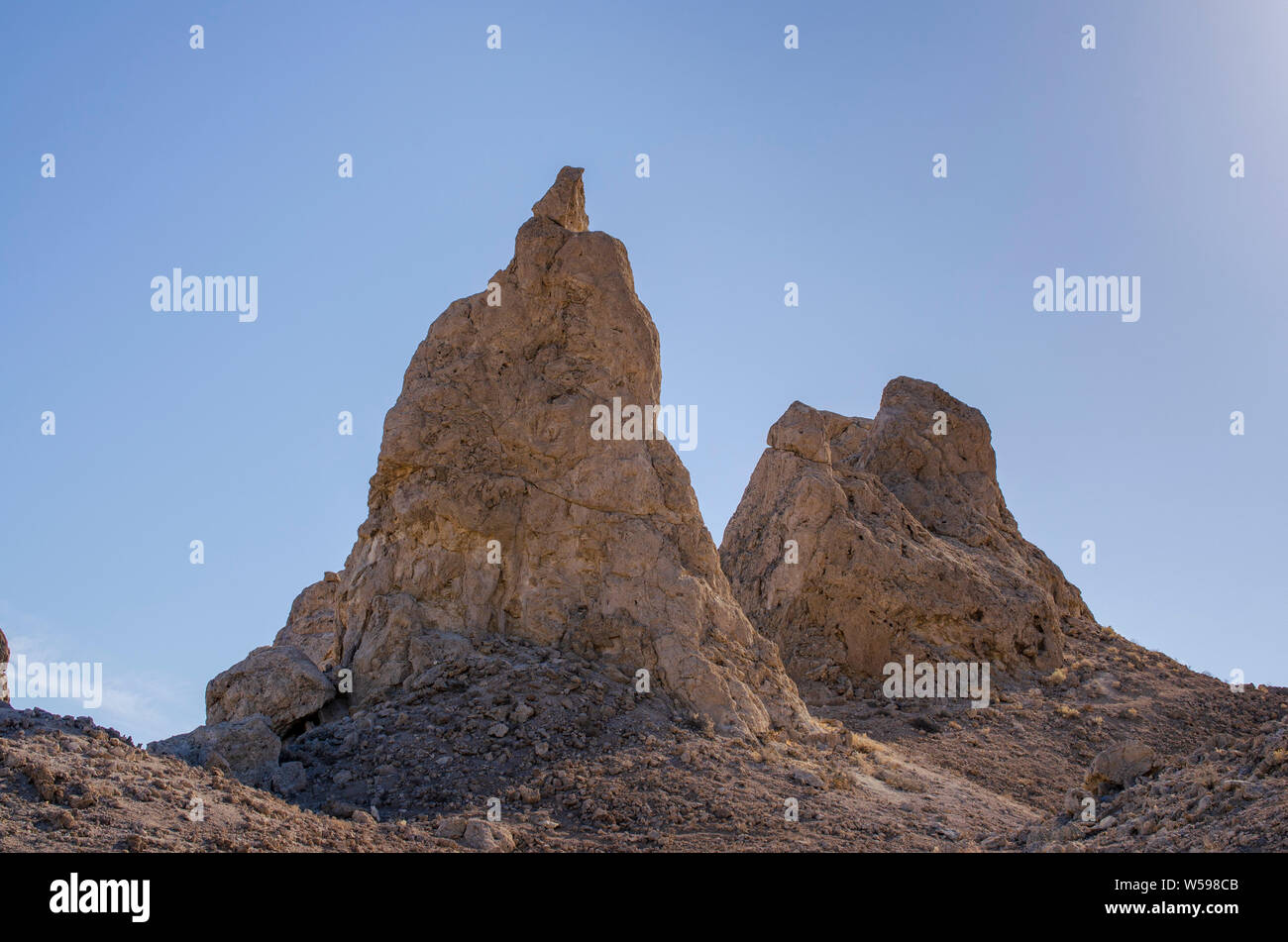 Two large pinnacles next to each other reaching for the blue sky Stock ...