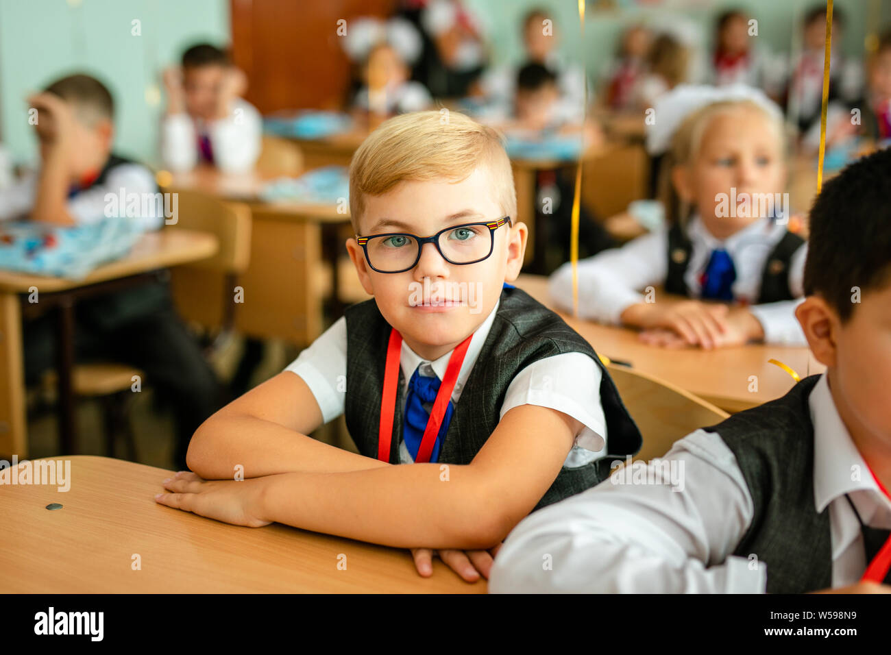 Little first-grader, girl-student goes to school on knowledge day ...