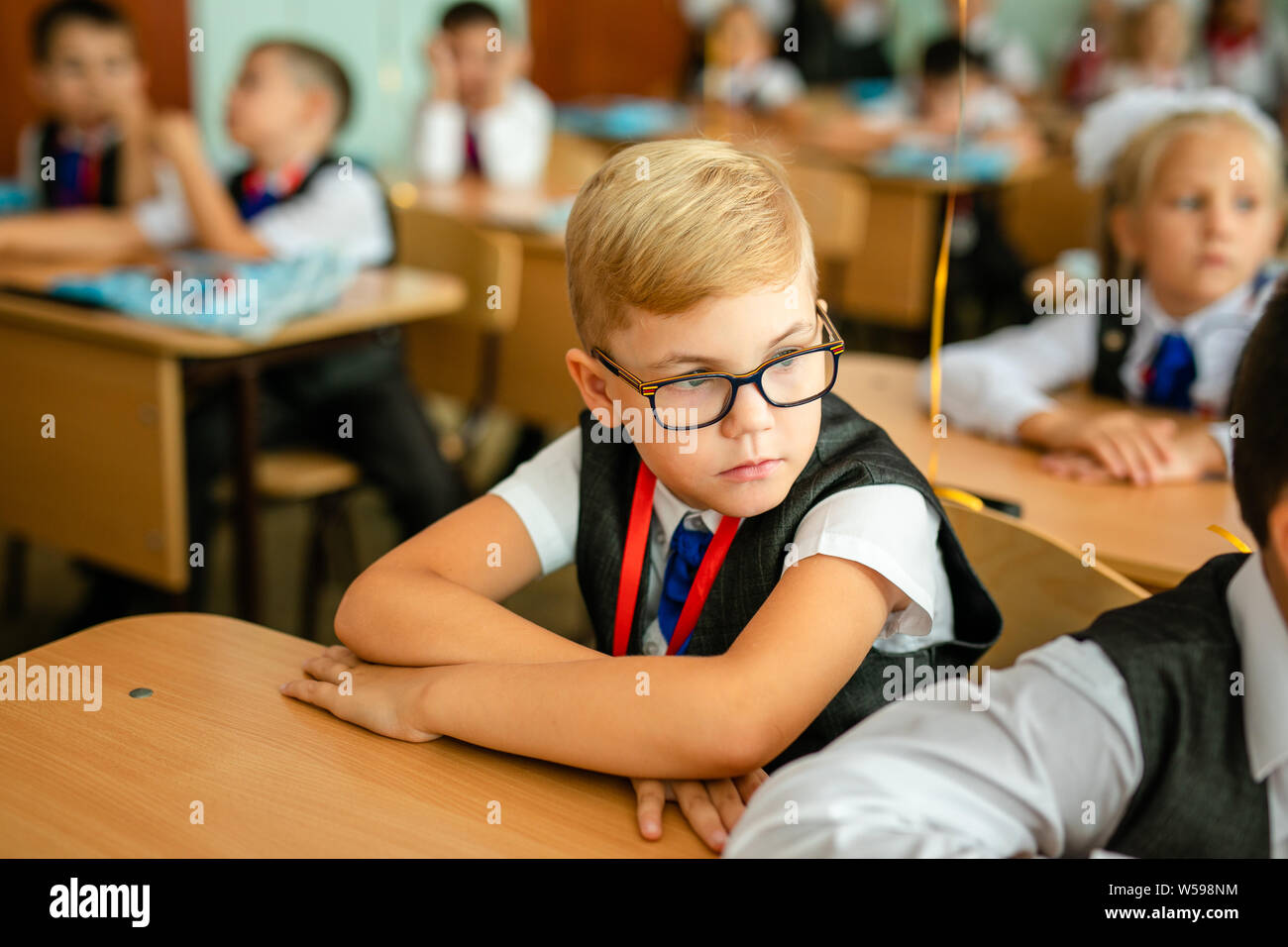 Little first-grader, girl-student goes to school on knowledge day ...