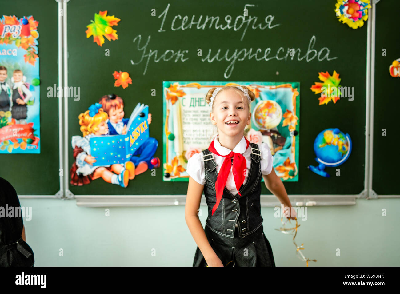 Little first-grader, girl-student goes to school on knowledge day ...