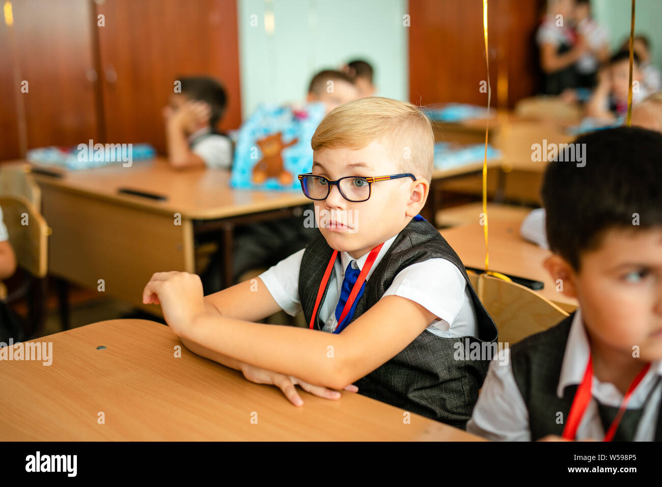 Little first-grader, girl-student goes to school on knowledge day ...