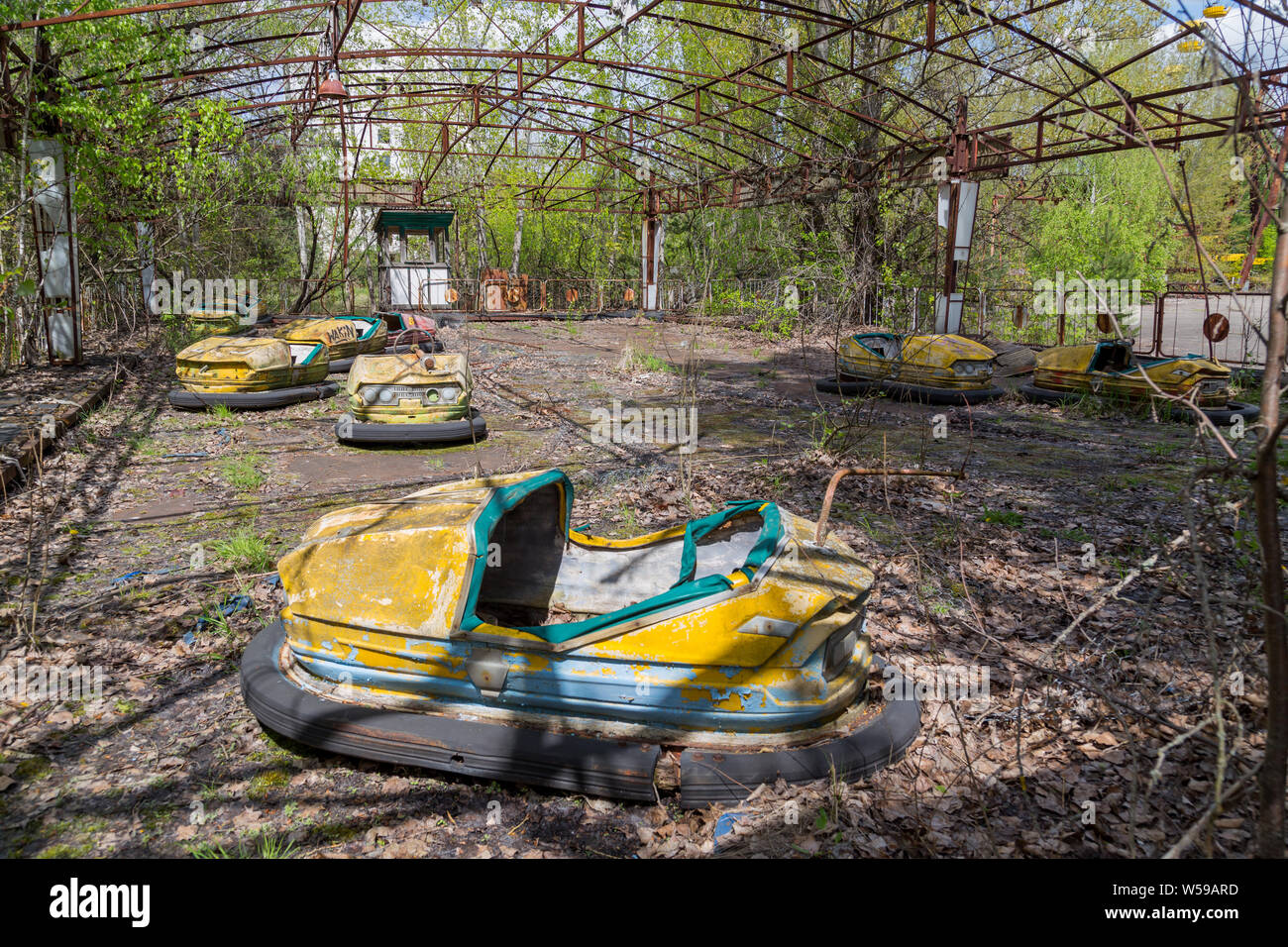 Old broken rusty metal radioactive children's electric cars abandoned ...