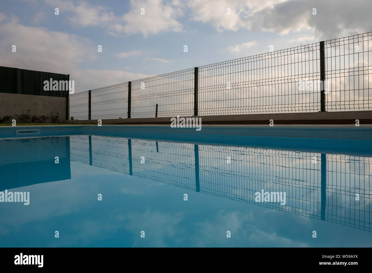 swimming pool with blue water Stock Photo - Alamy