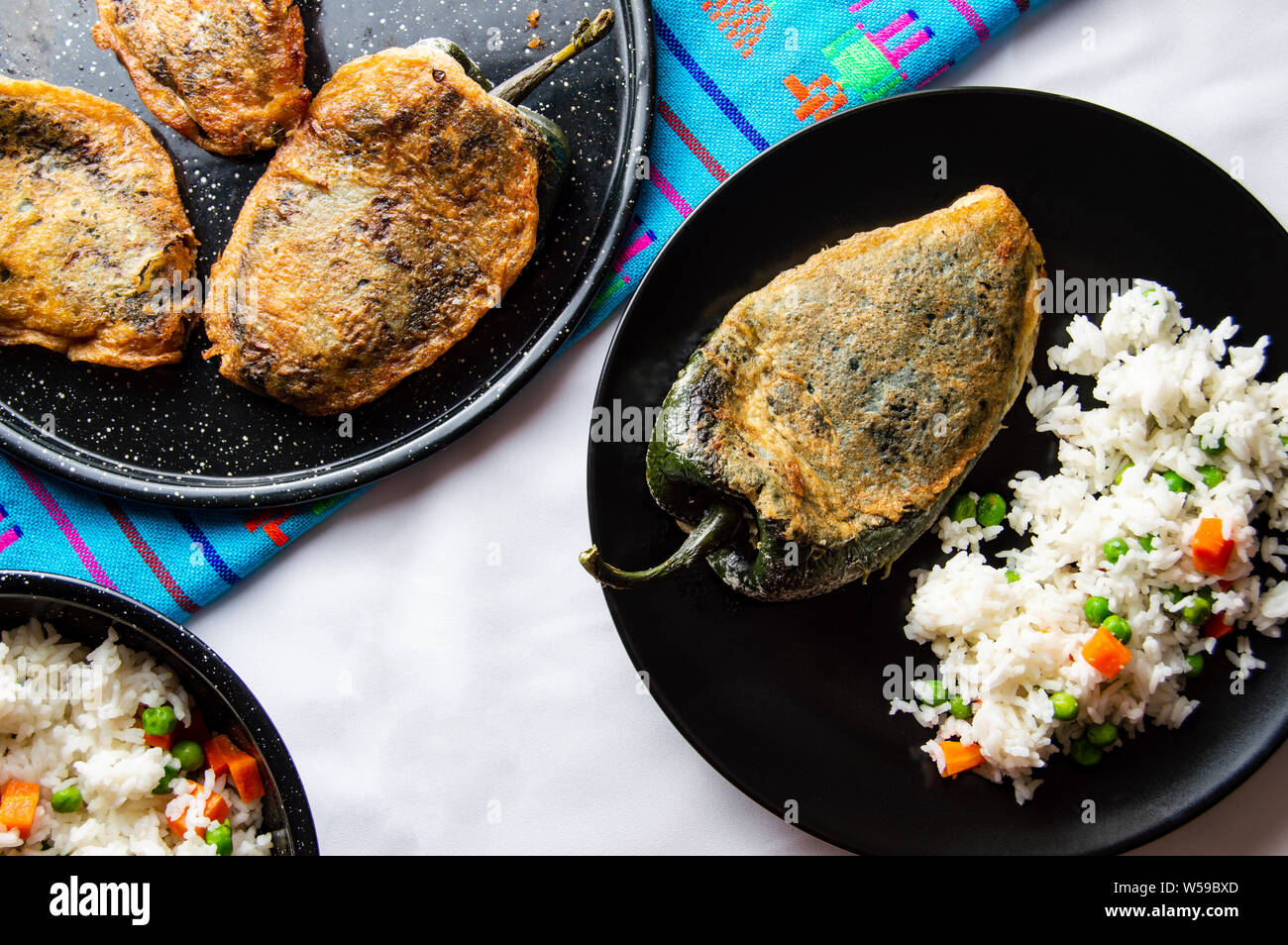 Mexican stuffed chilies (Chiles Rellenos), poblano chilies filled with ...