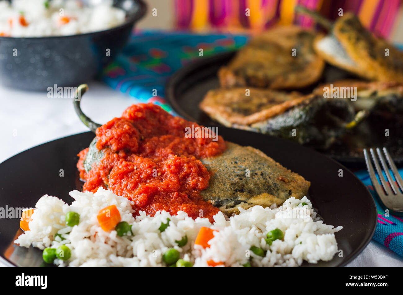 Mexican stuffed chili (Chiles Rellenos), poblano chili filled with ...
