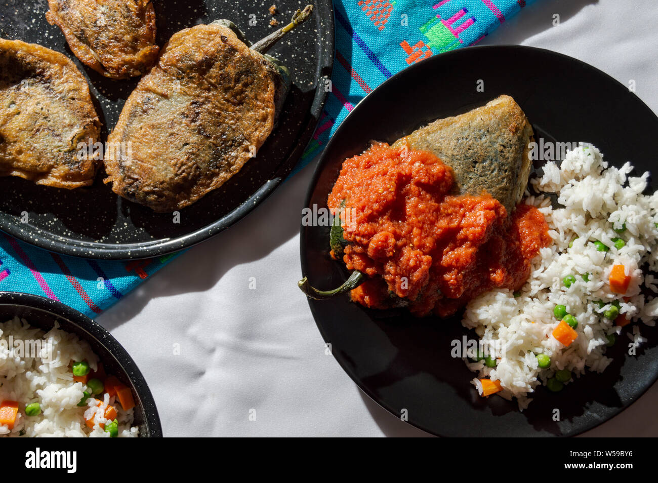 Mexican stuffed chilies (Chiles Rellenos), poblano chilies filled with ...