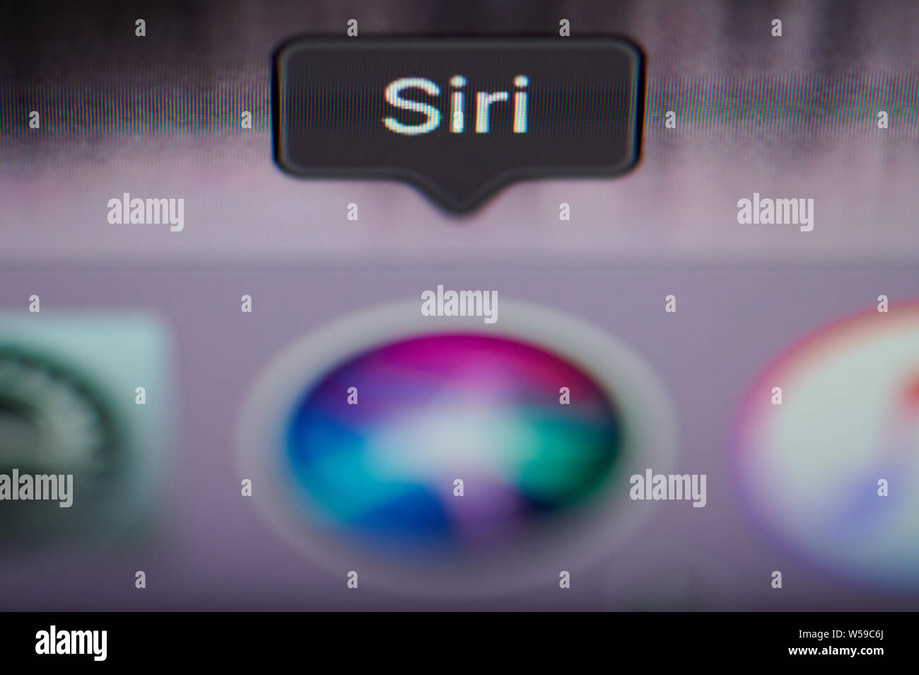 New york, USA - july 26, 2019: Selecting siri application on computer ...