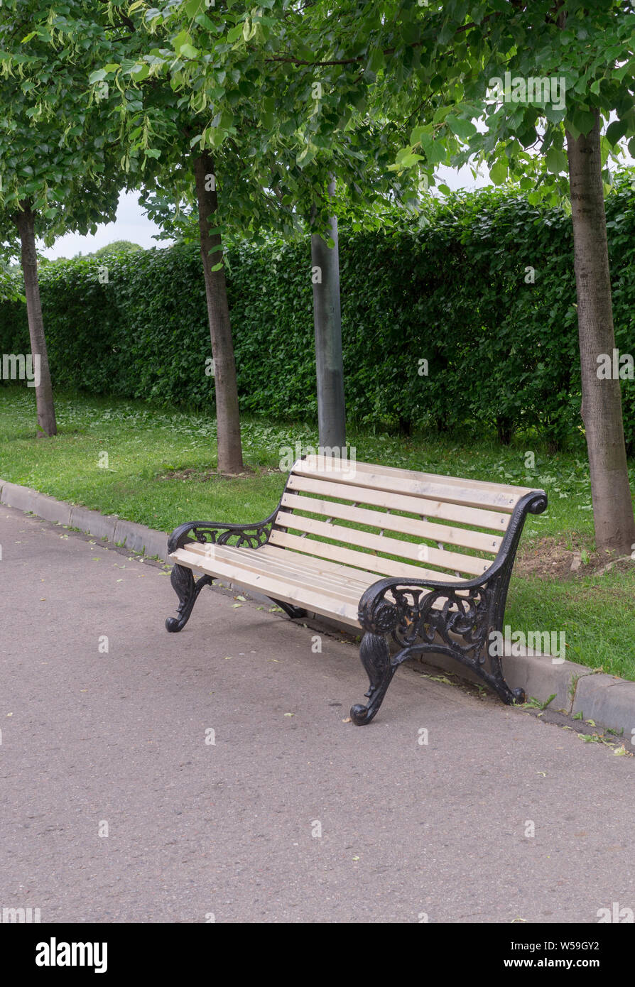 path with bench in a quiet summer park. background, nature Stock Photo ...