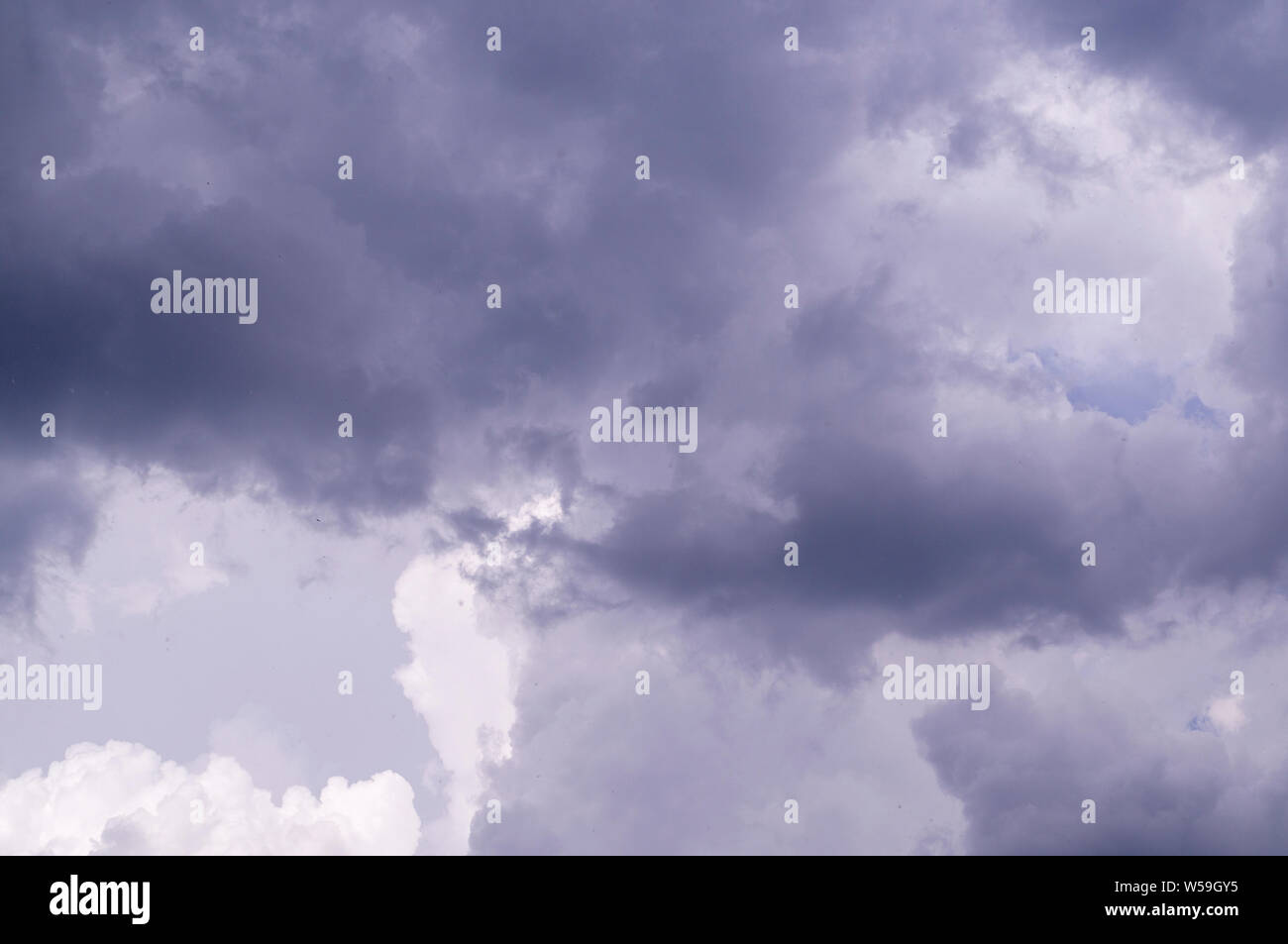 gray heavy rainy clouds at summer. background, weather Stock Photo - Alamy