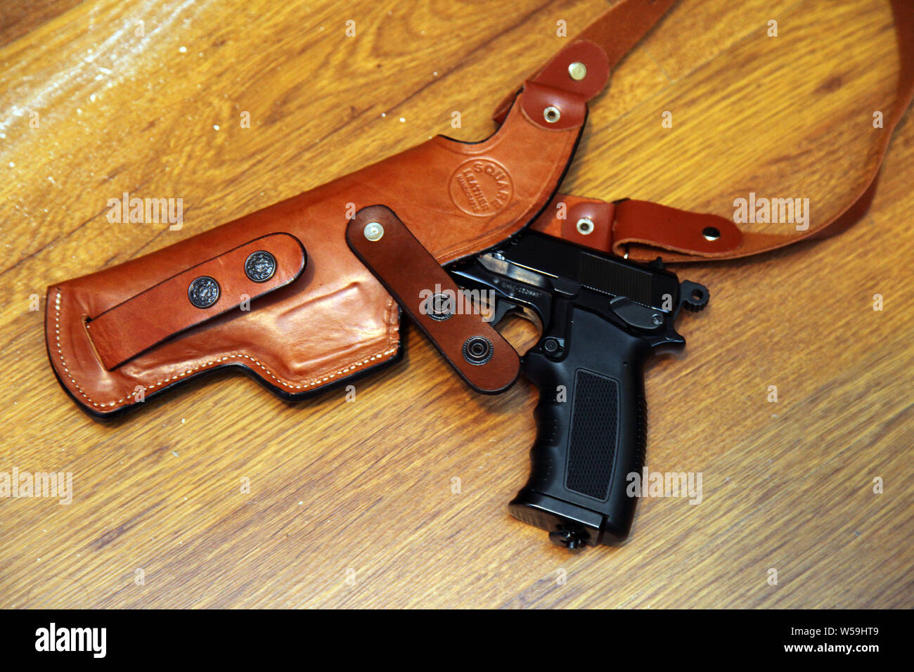 Gun and gun holster Stock Photo - Alamy