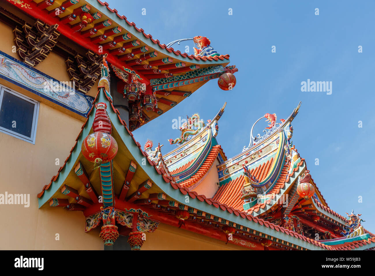 Colorful roof of Vihara Satya Dharma, Chinese Buddhist temple, honoring ...