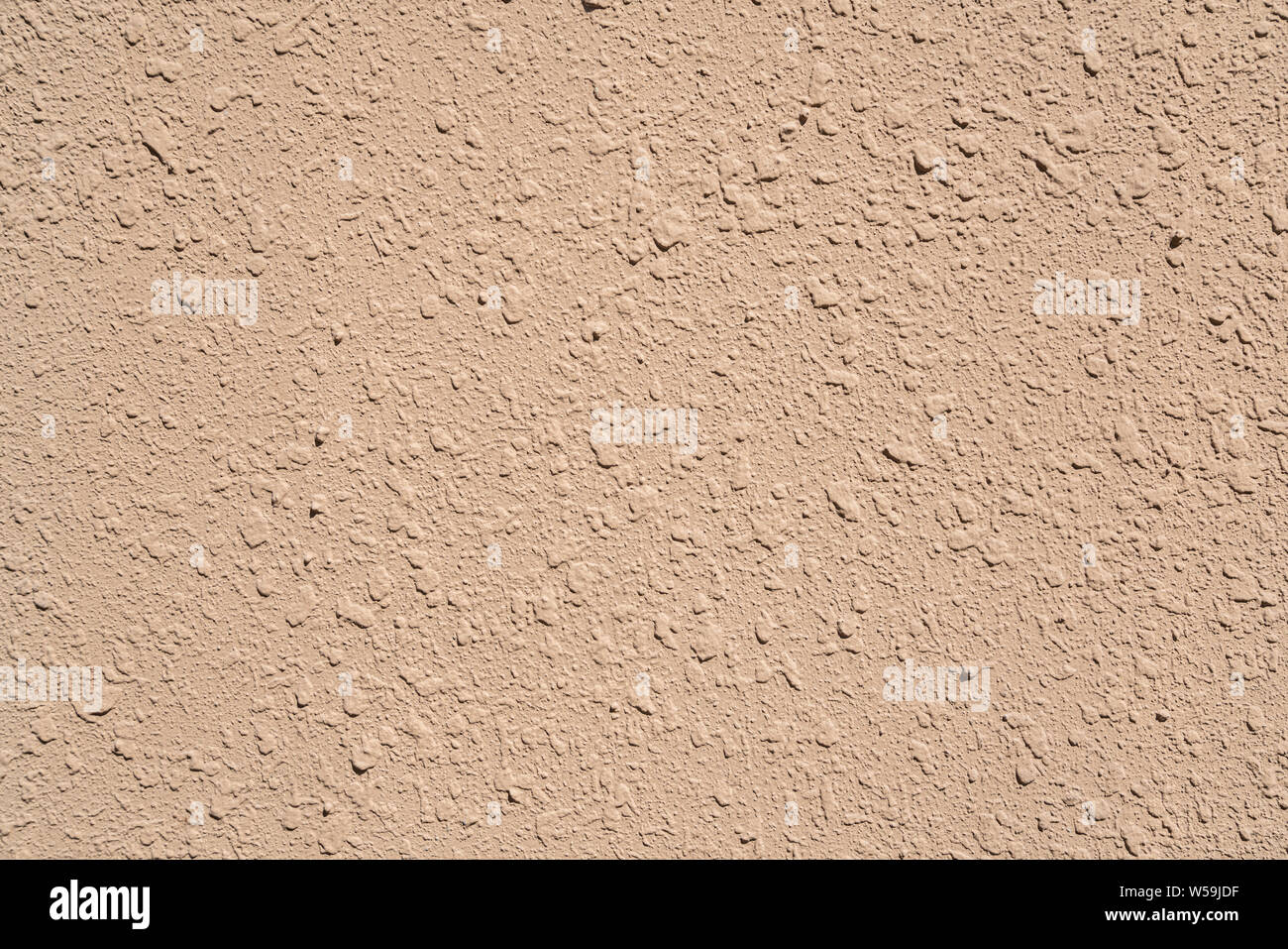 Stucco light painted wall background Stock Photo - Alamy