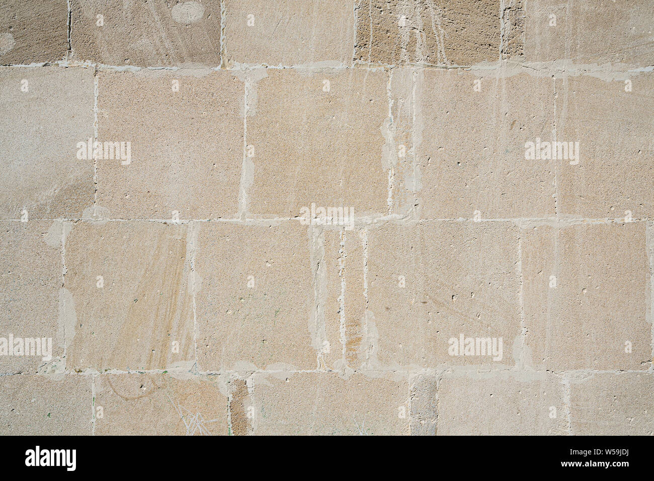 Building wall is lined with stone slabs Stock Photo - Alamy