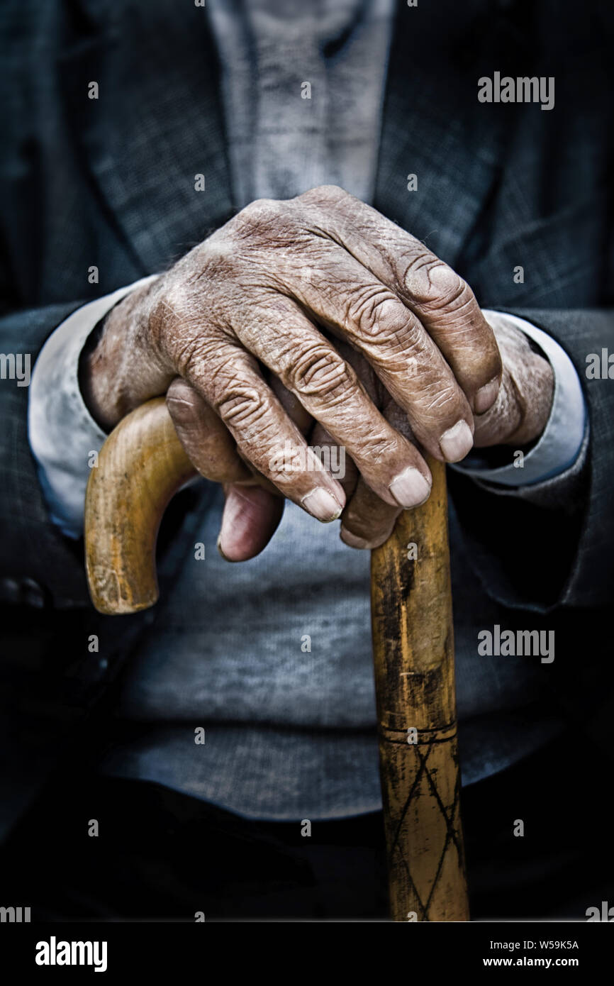 Old man with stick in hand hi-res stock photography and images - Alamy